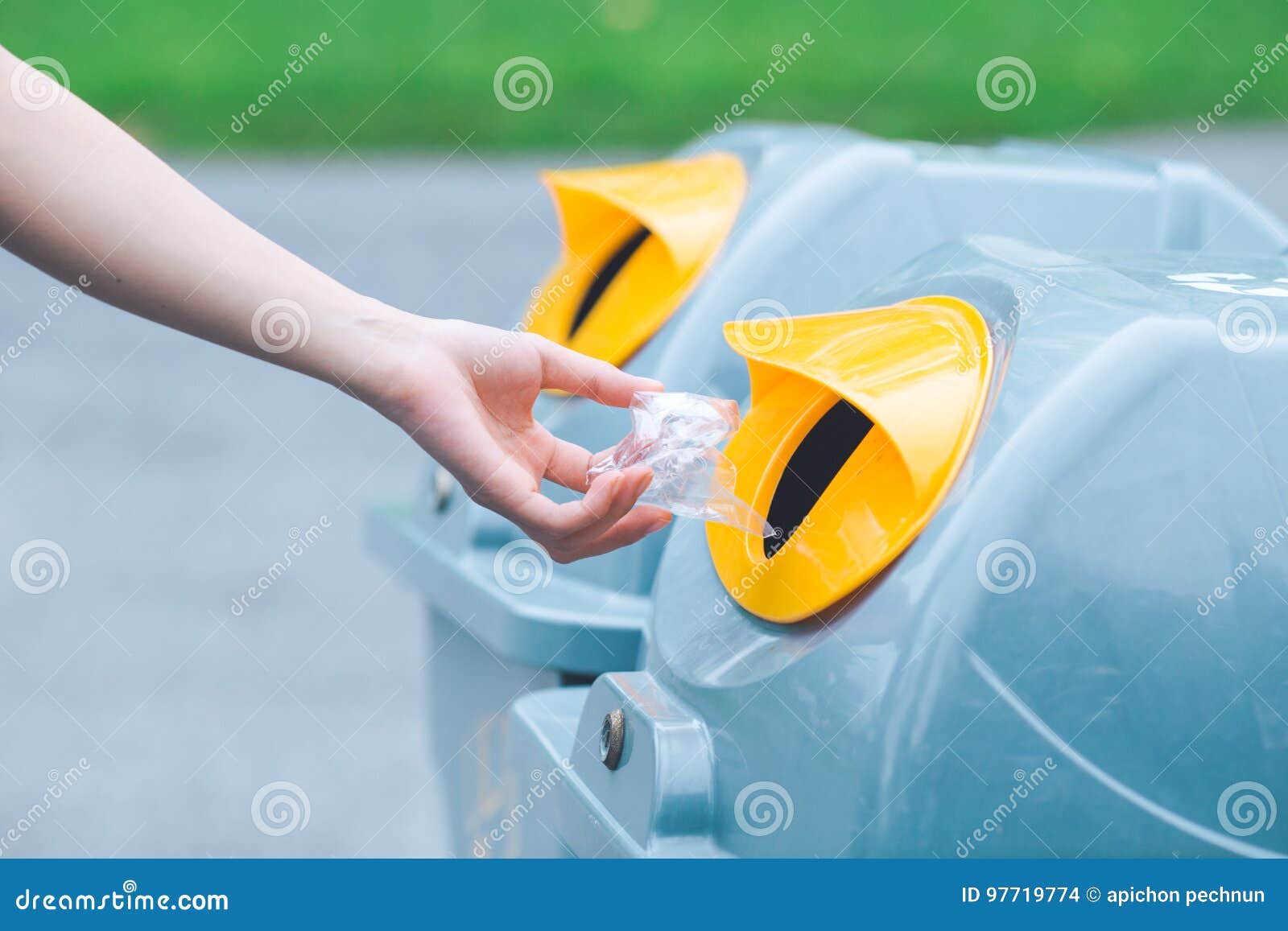 Hand Throwing a Plastic Bag into the Bin. Stock Photo - Image of ...