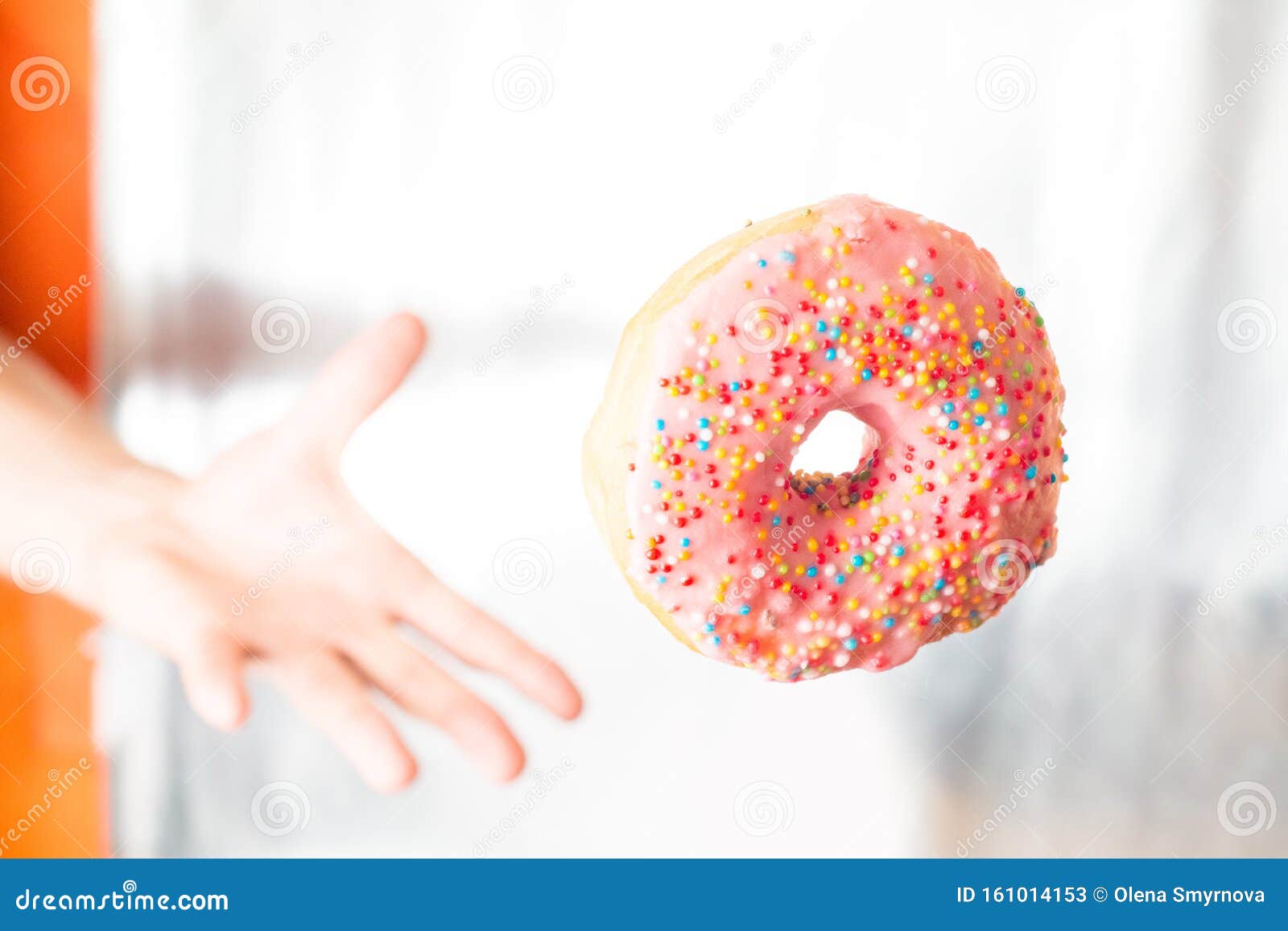 Hand Throws and Catches a Pink Donut Stock Image - Image of dessert ...