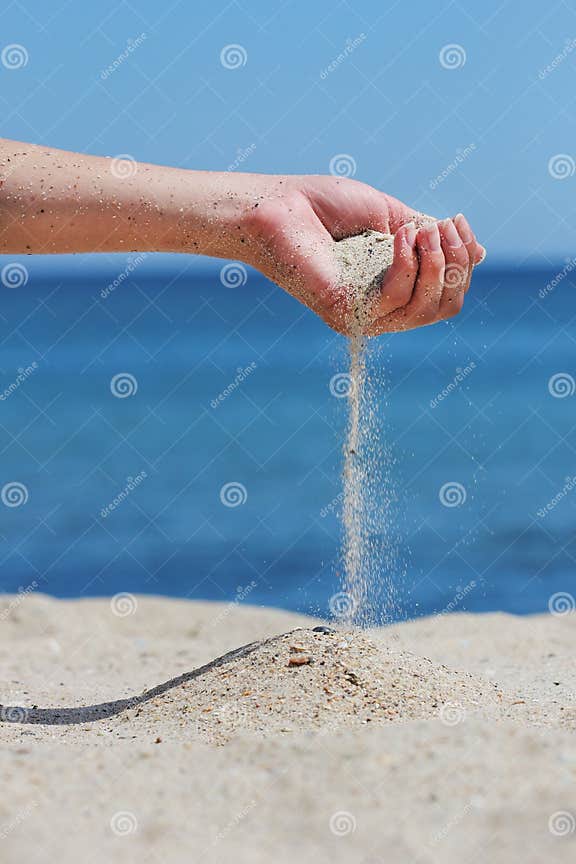 Hand throws sand stock photo. Image of hand, dreams, pours - 28690476