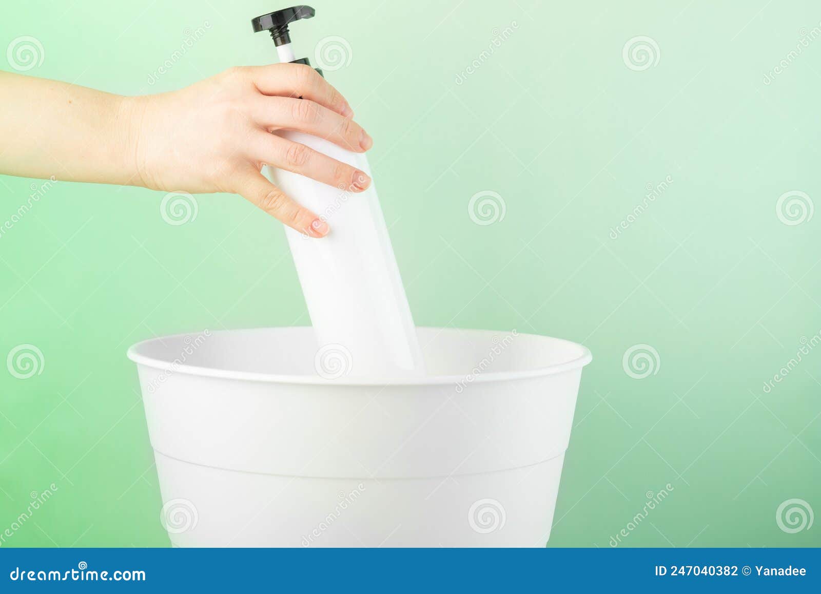 Hand Throws Shampoo Dispenser into Trash Can Stock Photo - Image of ...