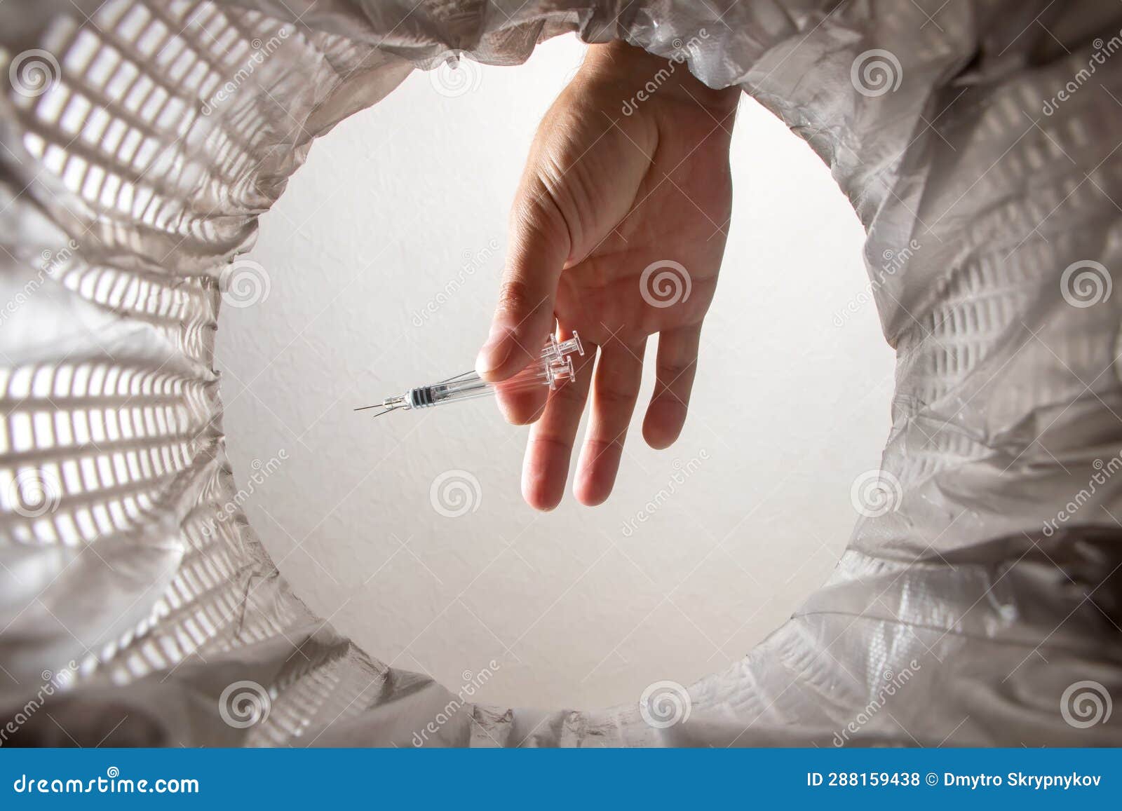 Hand Throws Syringe into Trash Bin with Package. Inside View Stock ...