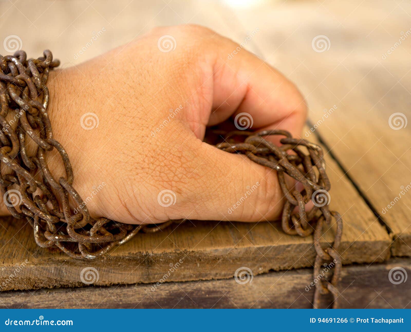 The Hand are Tied with Rusty Chain for Not To Escape Stock Photo ...