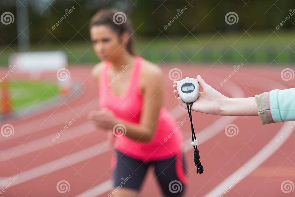 Hand Timing a Womans Run on the Running Track Stock Image - Image of ...
