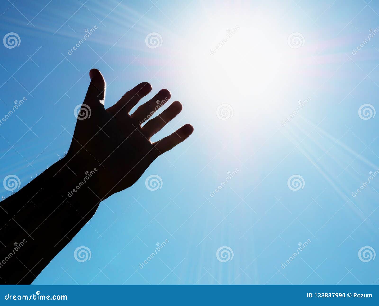 Hand to sun stock photo. Image of bright, magic, blue - 133837990