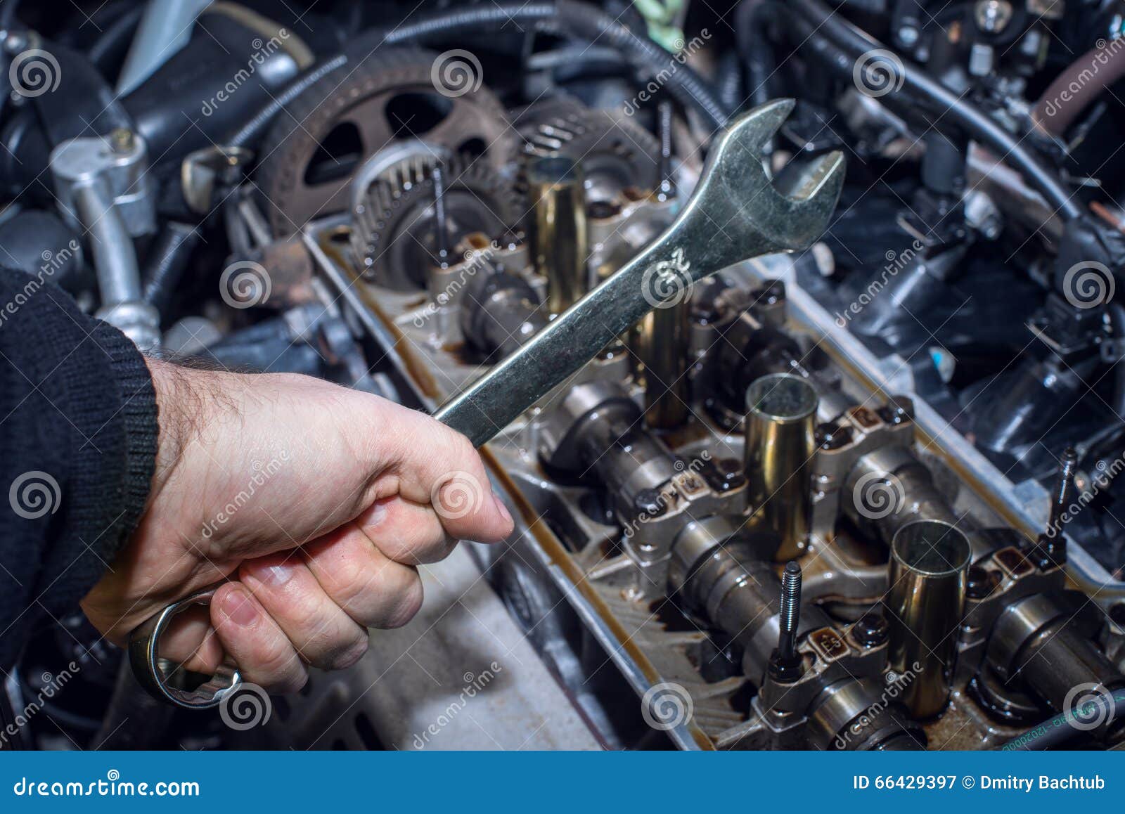 Hand with Tool on the Motor Background Stock Image - Image of armed ...