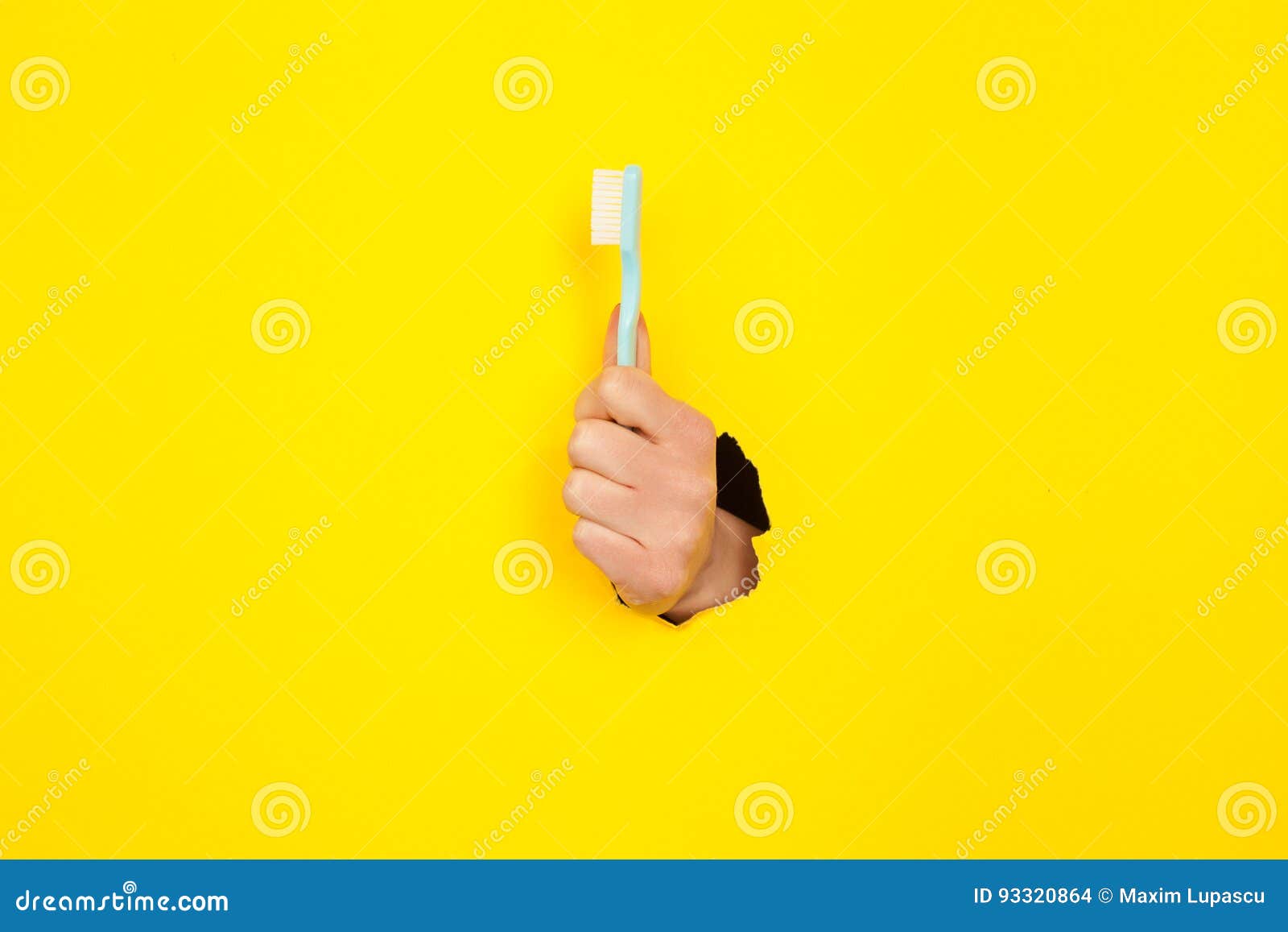 Hand with toothbrush stock photo. Image of care, freshness - 93320864