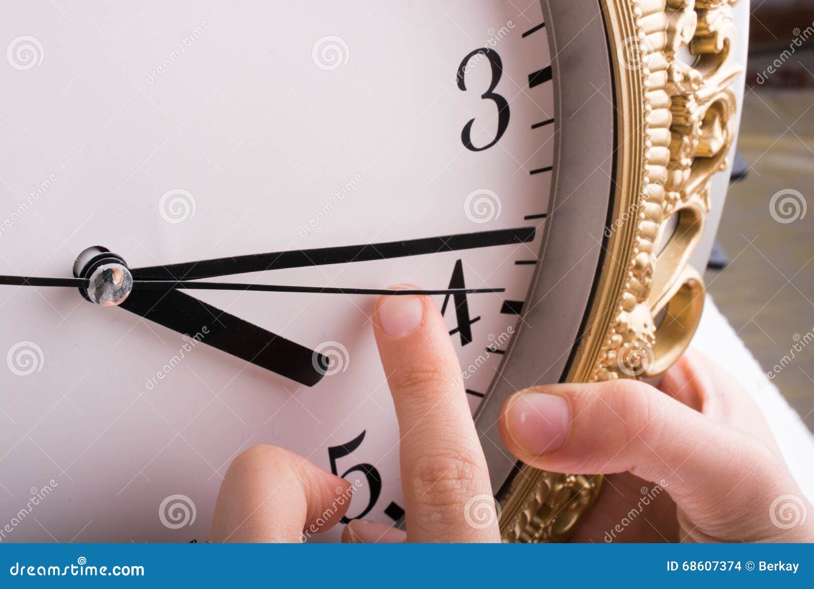 Hand in touch with a clock stock photo. Image of clock - 68607374