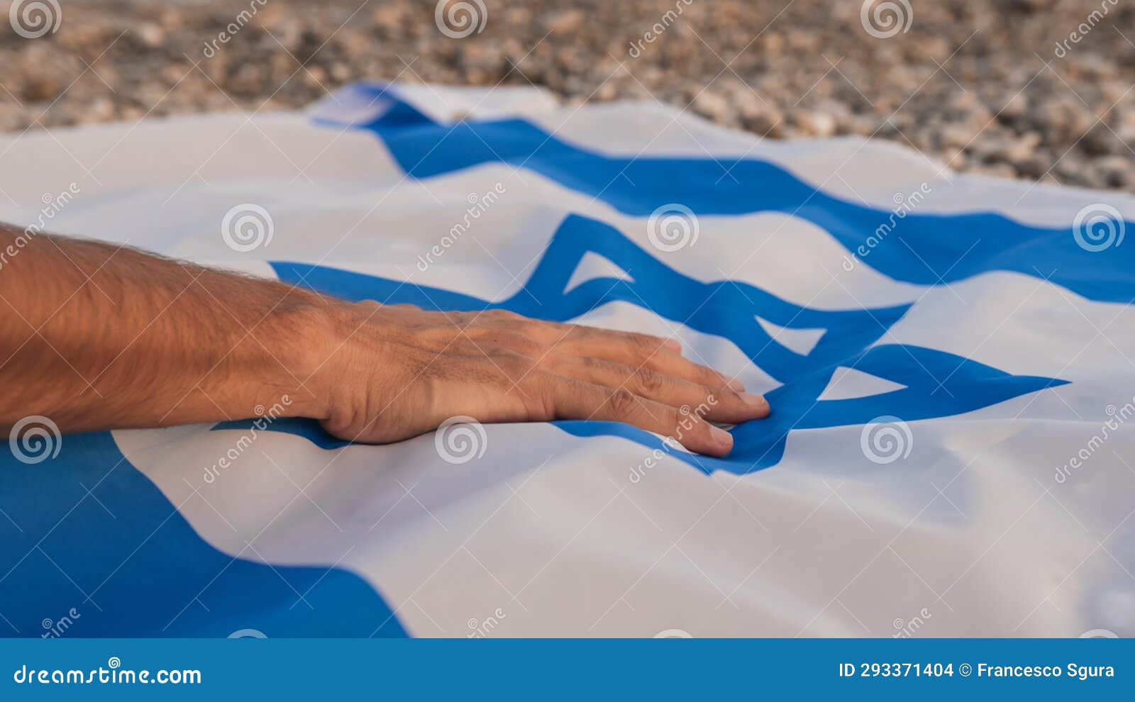 Hand Touch Flag of Israel stock photo. Image of wind - 293371404