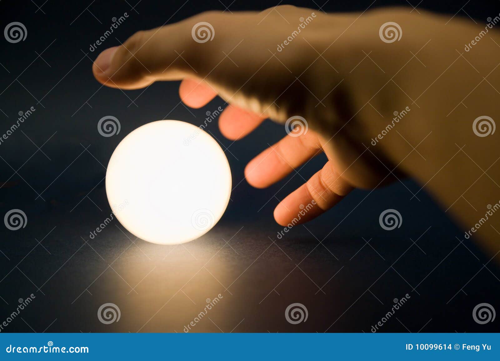 Hand Touching a Bright Ball Stock Photo - Image of hand, fantasy: 10099614