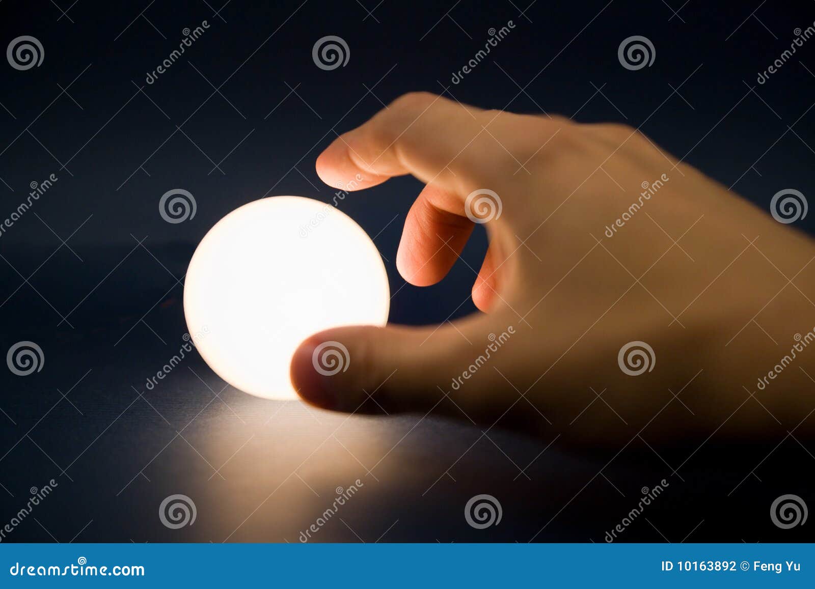Hand Touching a Bright Ball Stock Photo - Image of shiny, intelligence ...
