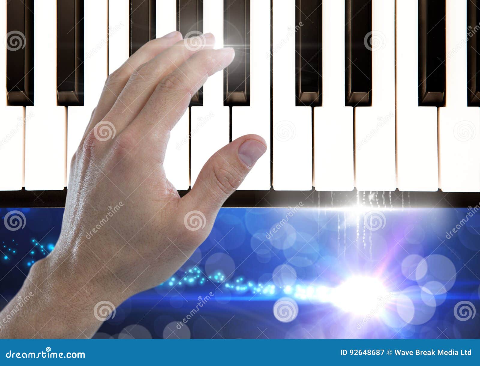Hand Touching Piano Keys with Sparkling Lights Stock Image - Image of ...