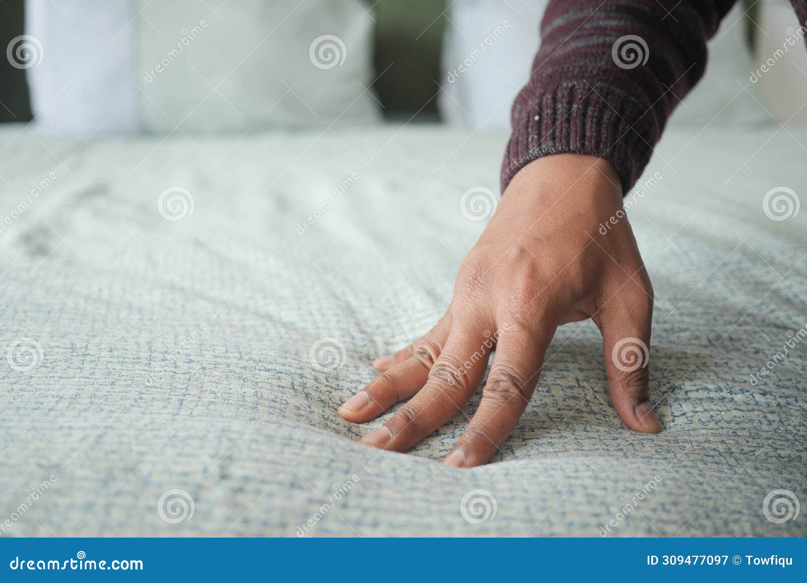 Hand Touching and Pressing Orthopedic Mattress on Bed. Stock Image ...