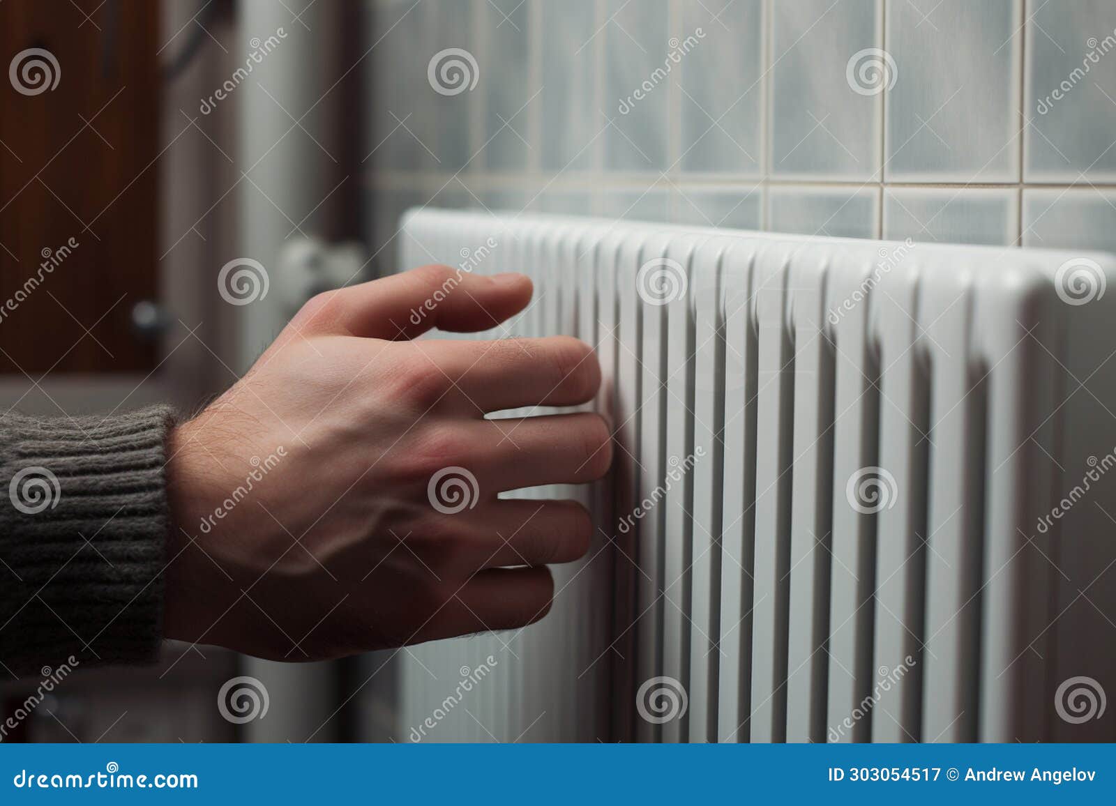 A Hand Touching White Radiator of a Central Heating System, Checking ...