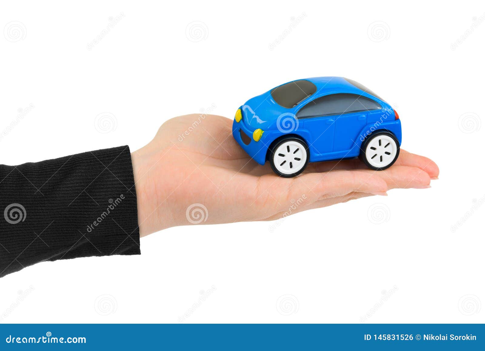 Hand and toy car stock photo. Image of luxury, rental - 145831526
