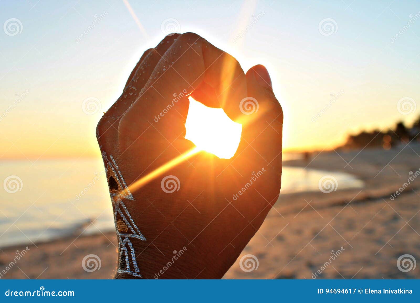 Hand Trying To Catch the Sun Stock Image - Image of hold, relax: 94694617
