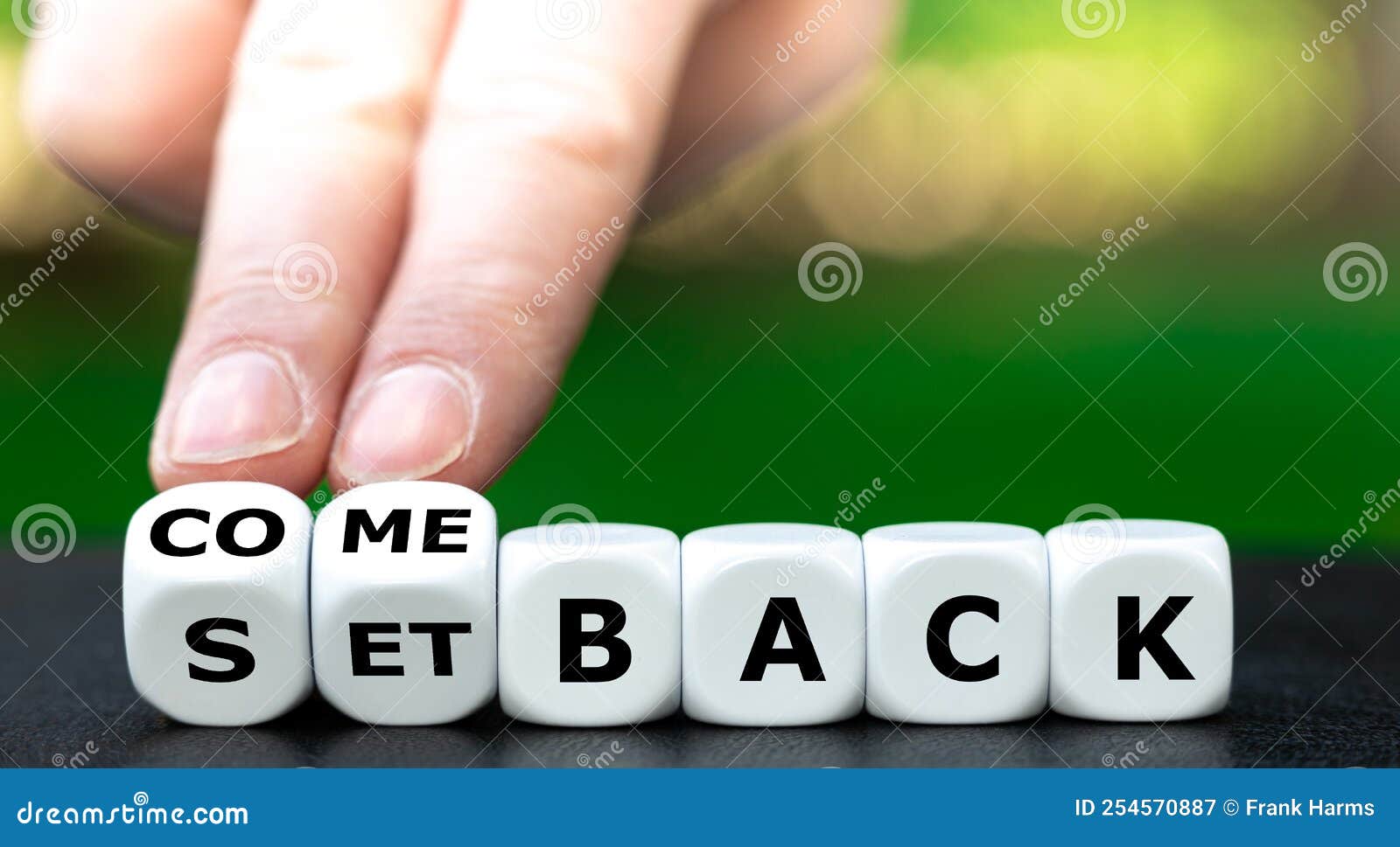 Hand Tuns Dice and Changes the Expression `setback` To `comeback ...