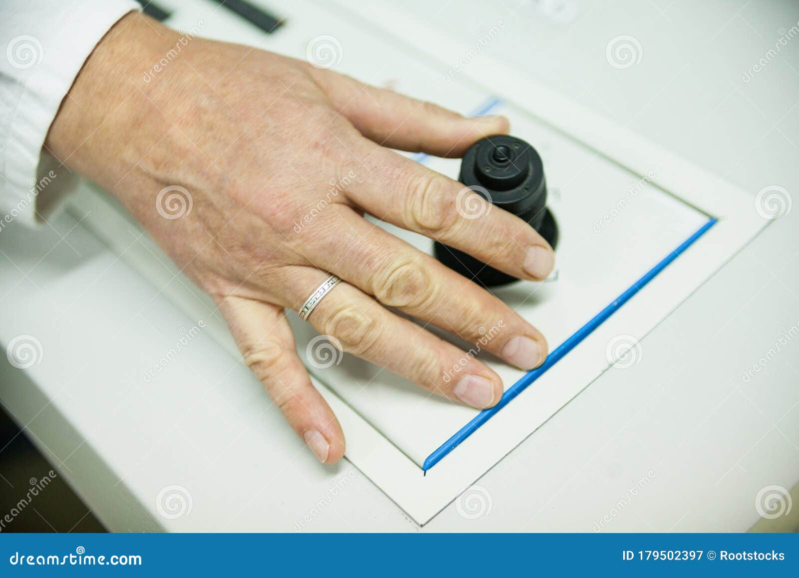 Hand Turning the Button on the Control Panel Stock Image - Image of ...