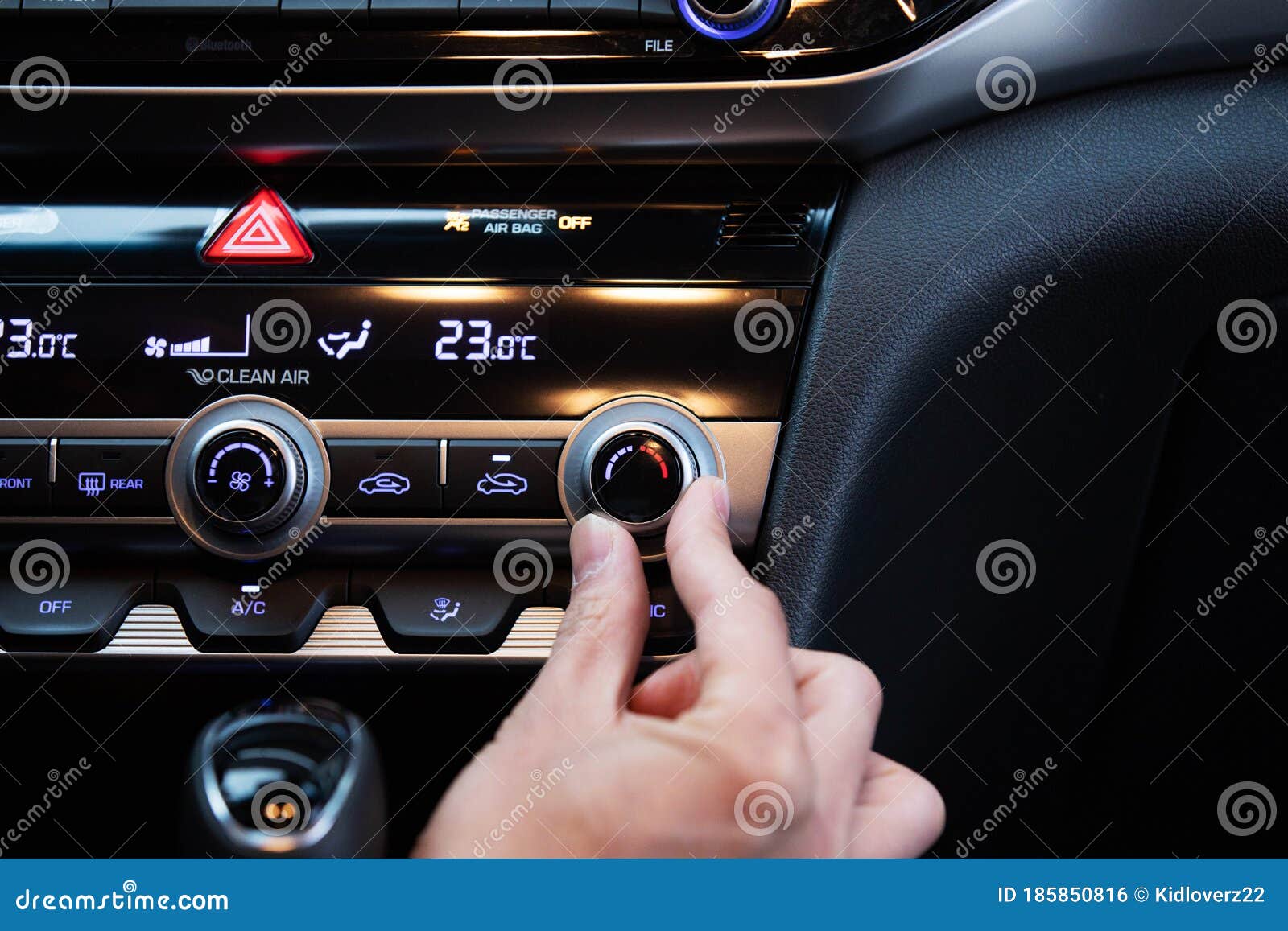 Hand Turning on Car`s Air Conditioner Dial. Hand Adjusting Heater ...