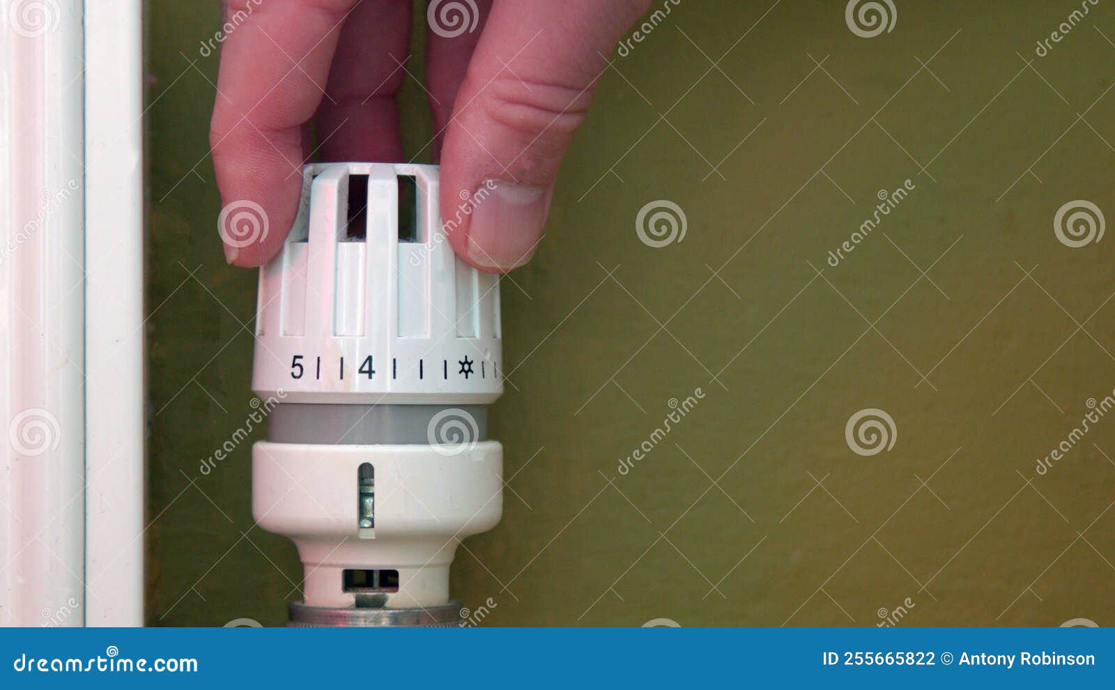 Hand Turning Down Radiator Heating Control Stock Photo - Image of ...