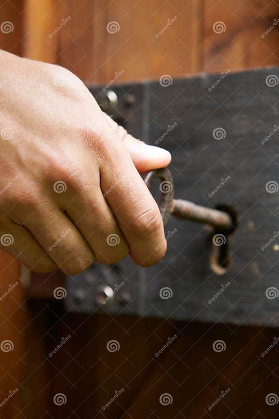 Hand Turning Key in Old Fashioned Lock Stock Image - Image of caucasian ...