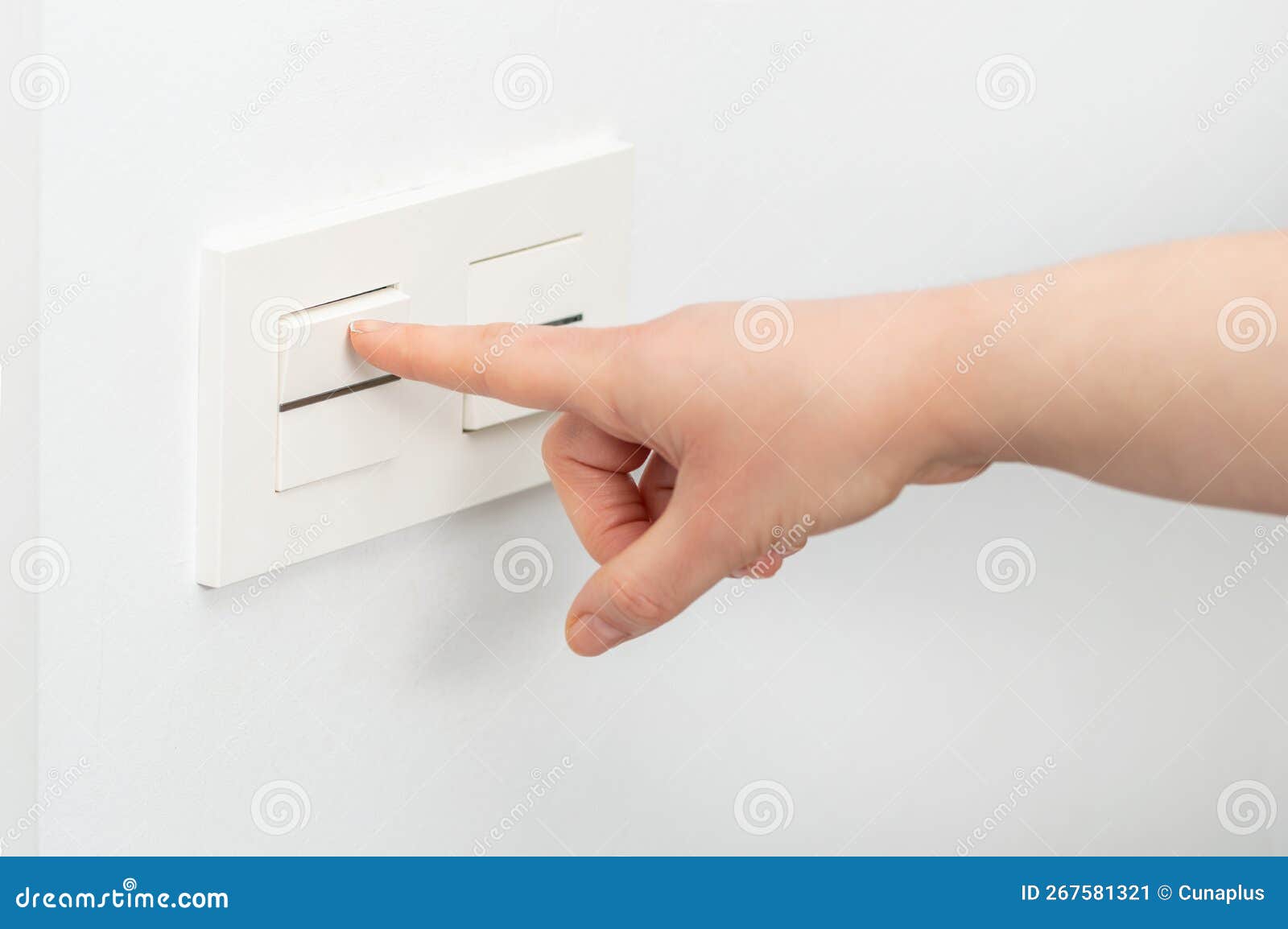 Hand turning on the light stock image. Image of home - 267581321