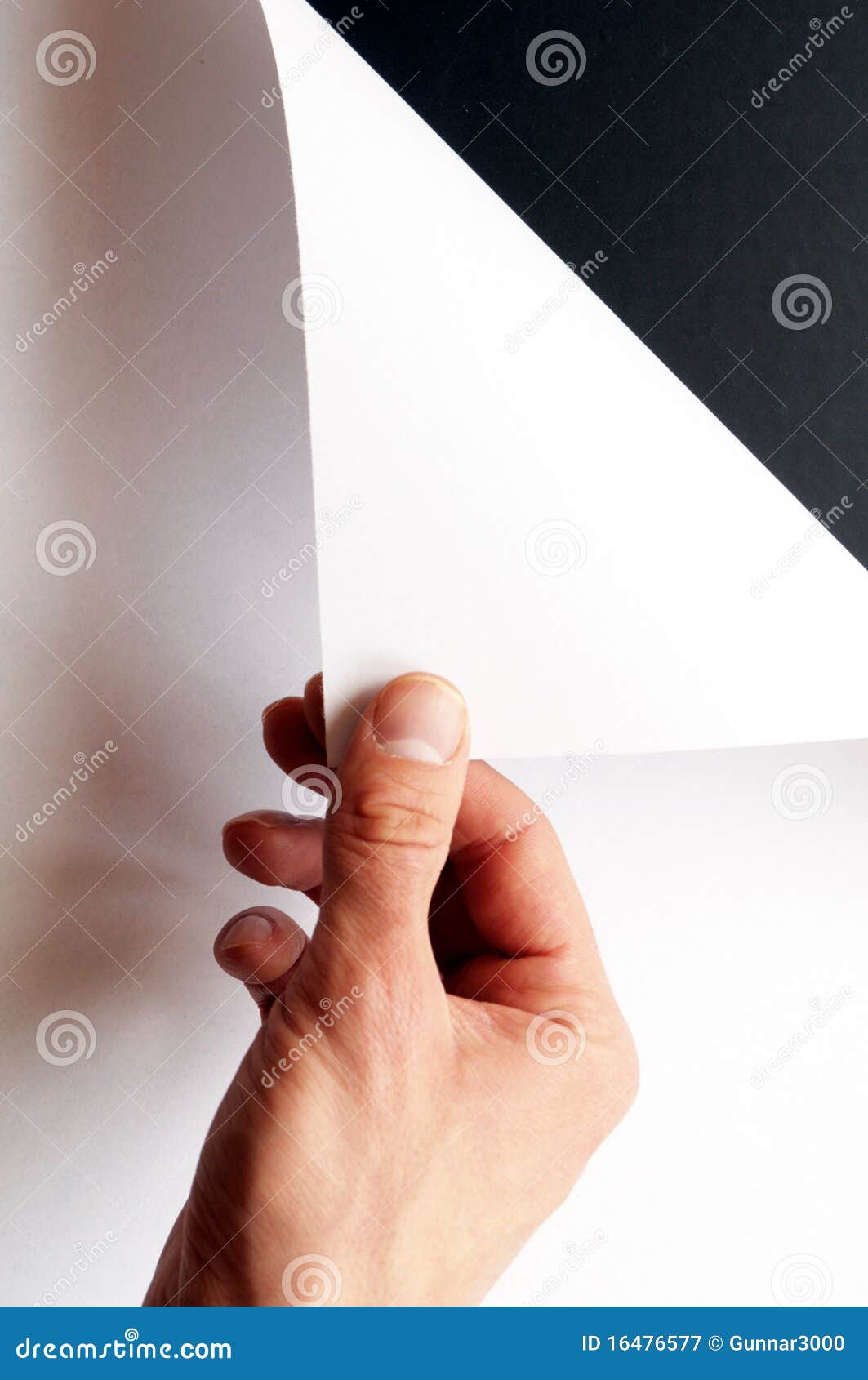 Hand turning paper stock image. Image of open, curl, display - 16476577