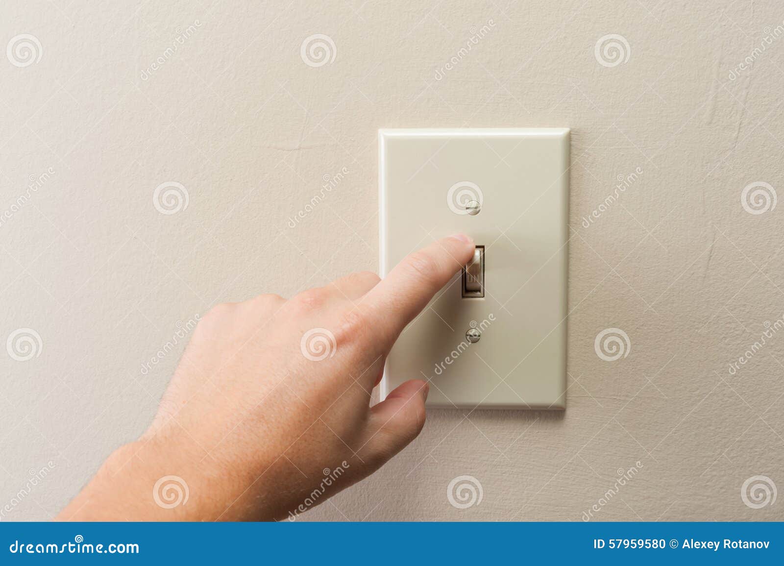 Hand Turning Wall Light Switch Off. Stock Photo - Image of interior ...