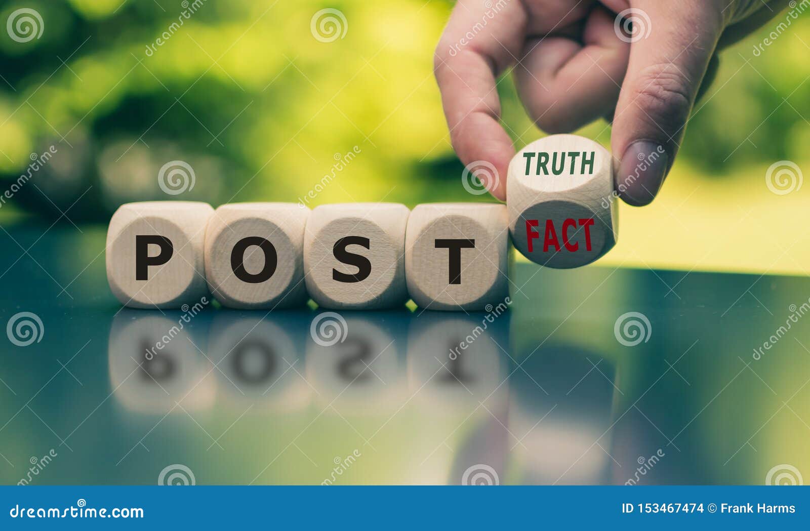 Hand Turns a Cube and Changes the Expression `post Fact` To `post Truth ...