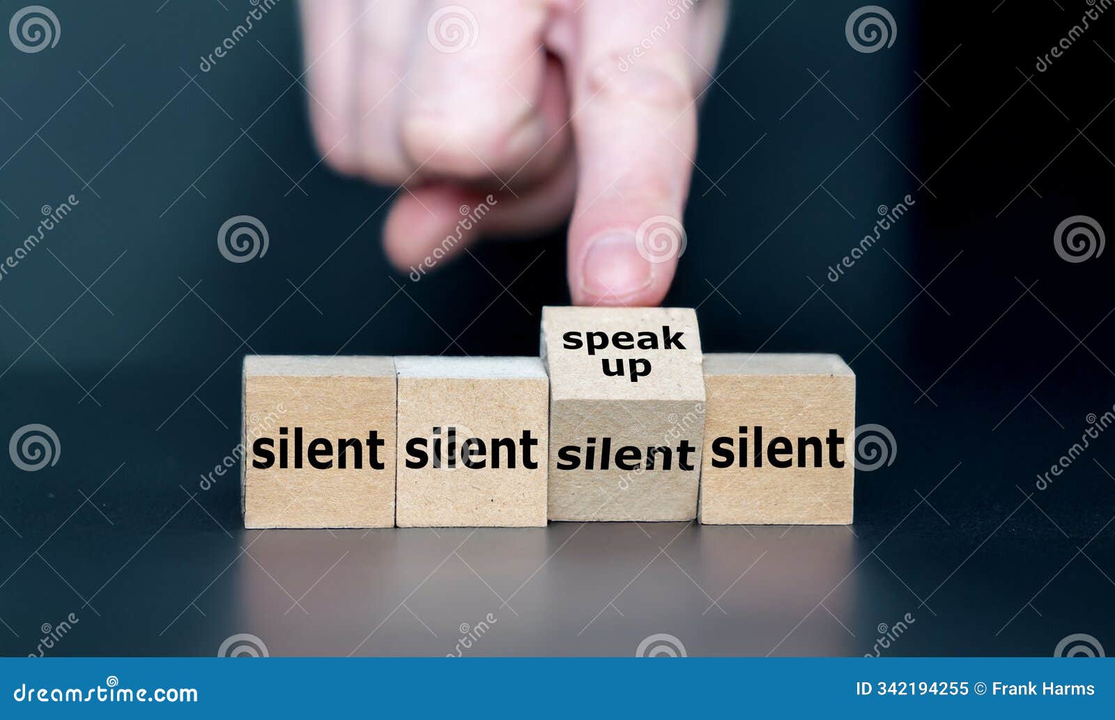 Hand Turns Cube and Changes the Expression Silent To Speak Up .Image ...