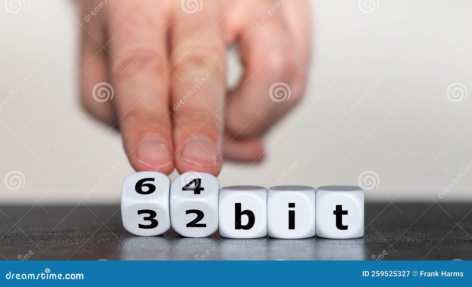 Hand Turns Dice and Changes the Expression `32 Bit` To `64 Bit`. Stock ...