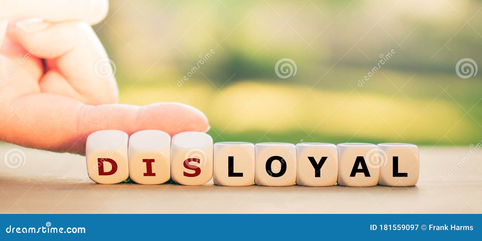 Hand Turns Dice and Changes the Expression `disloyal` To `loyal`. Stock ...