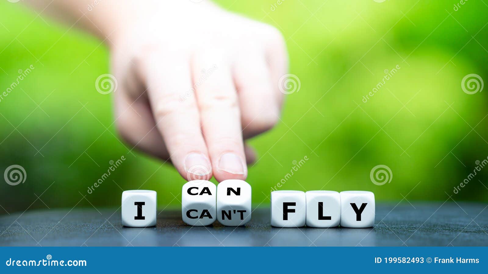 Hand Turns Dice and Changes the Expression `I Can`t Fly` To `I Can Fly ...