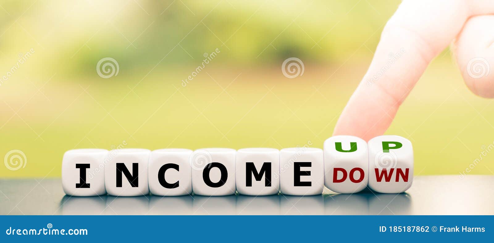 Hand Turns Dice and Changes the Expression `income Down` To `income Up ...