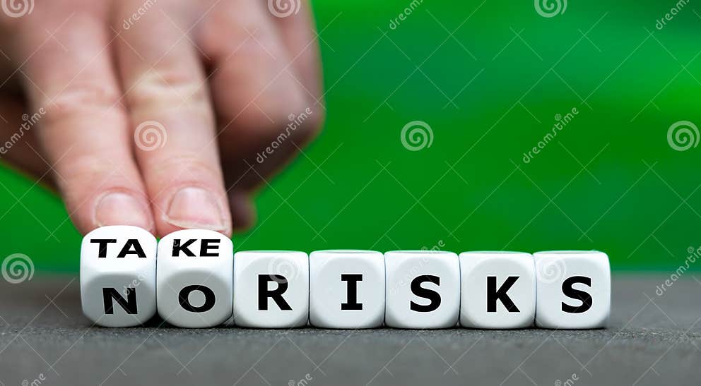 Hand Turns Dice and Changes the Expression `no Risks` To `take Risks ...
