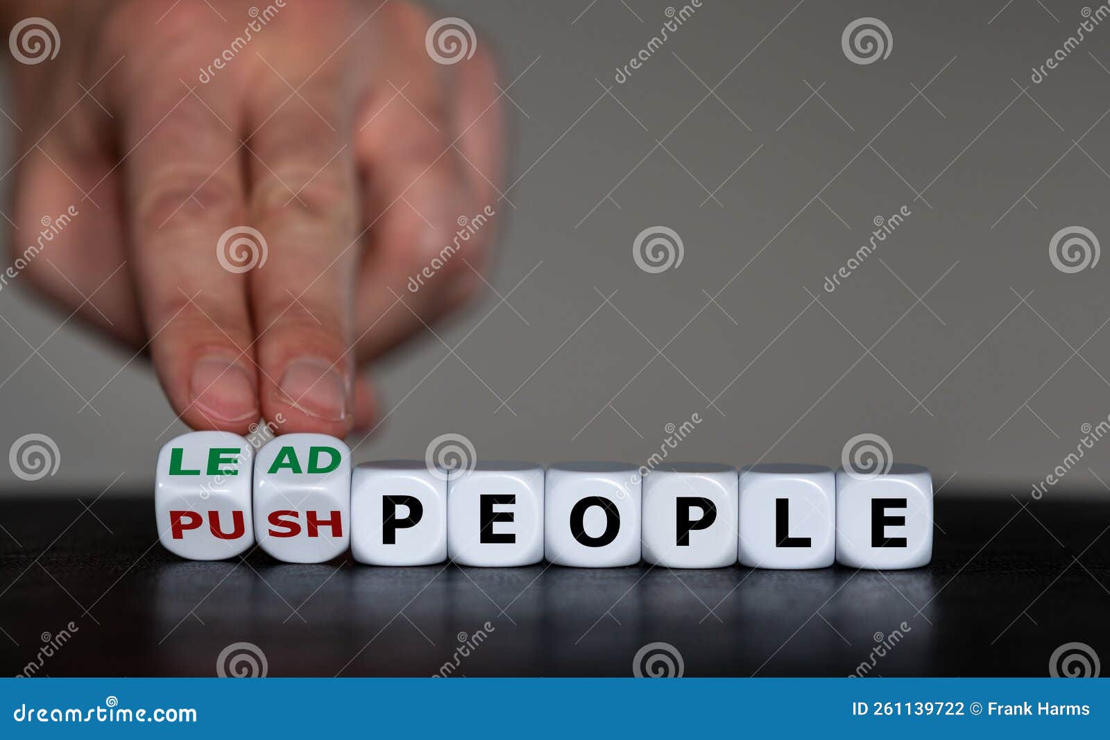 Hand Turns Dice and Changes the Expression `push Peaople` To `lead ...
