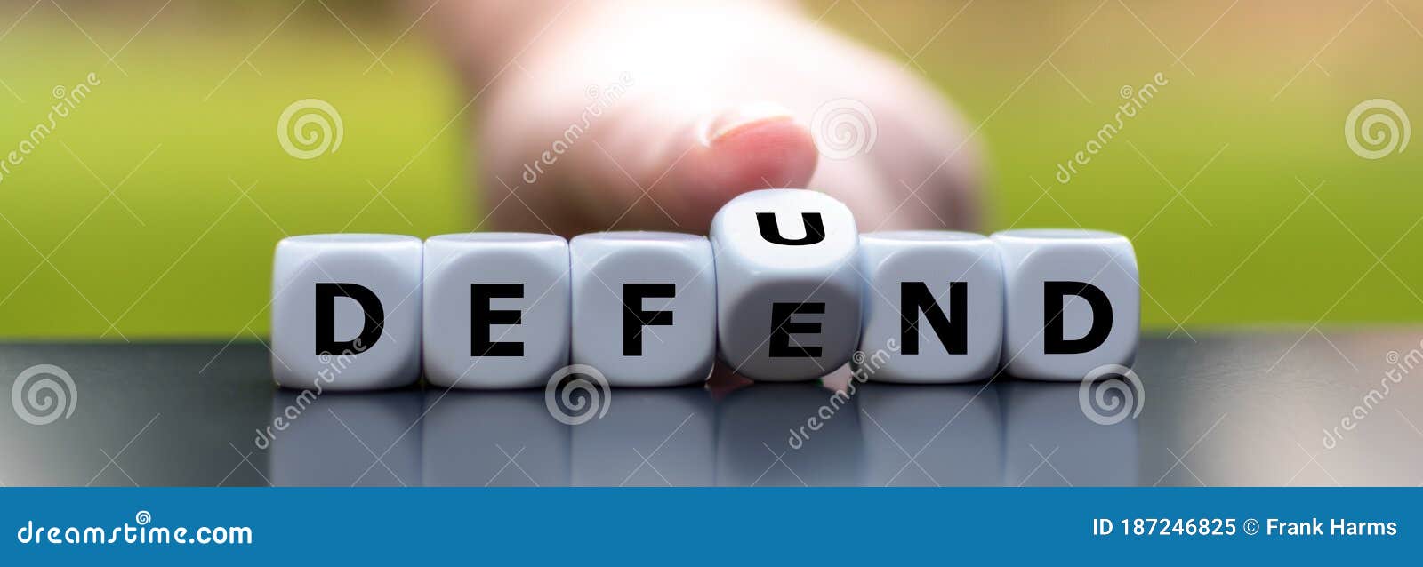 Hand Turns Dice and Changes the Word `defend` To `defund`. Stock Image ...
