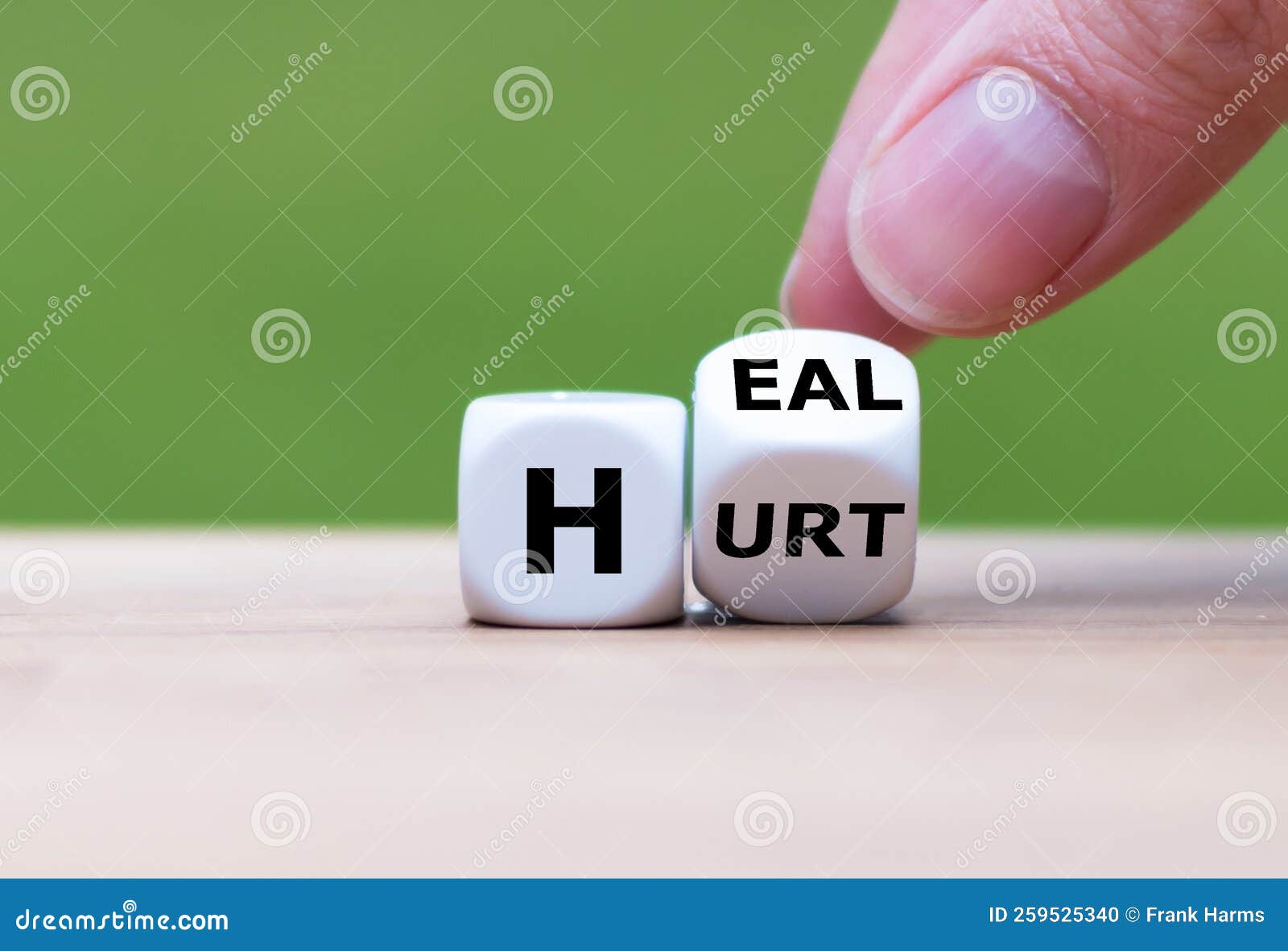 Word HURT On Wooden Cube Blocks In The Hands In Protective Gloves Of A ...