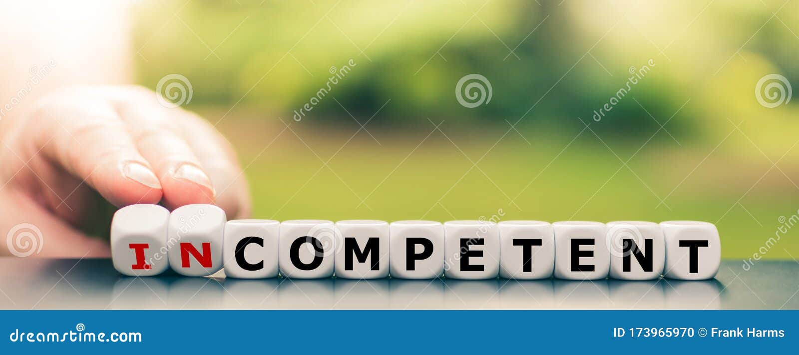 Hand Turns Dice and Changes the Word `incompetent` To `competent ...