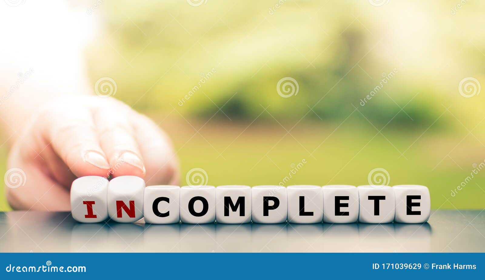 Hand Turns Dice and Changes the Word `incomplete` To `complete`. Stock ...