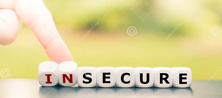 Hand Turns Dice and Changes the Word `insecure` To `secure`. Stock ...