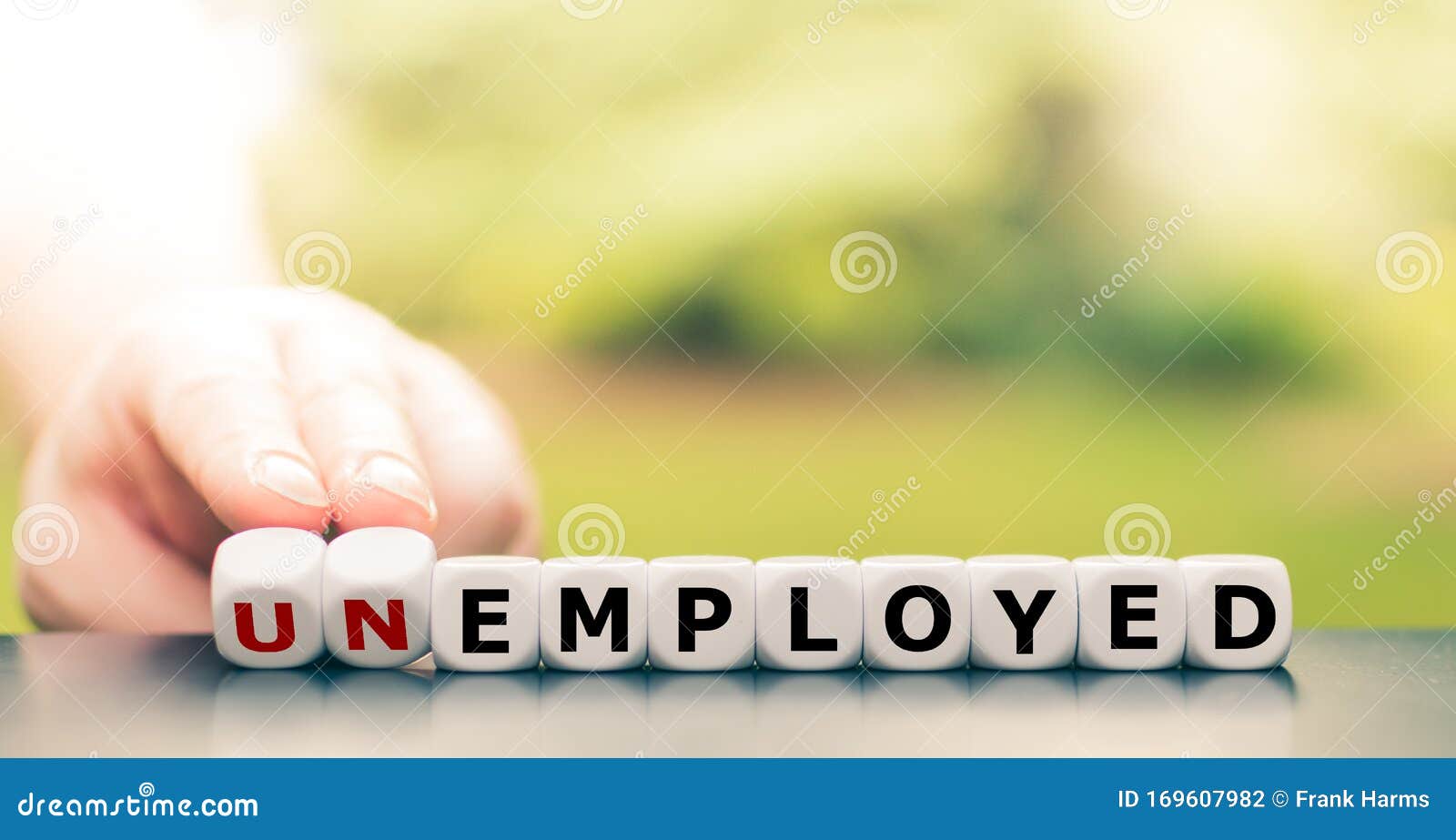 Hand Turns a Dice and Changes the Word `unemployed` To `employed ...