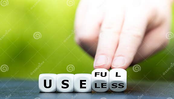 Hand Turns Dice and Changes the Word `useless` To `useful`. Stock Image ...
