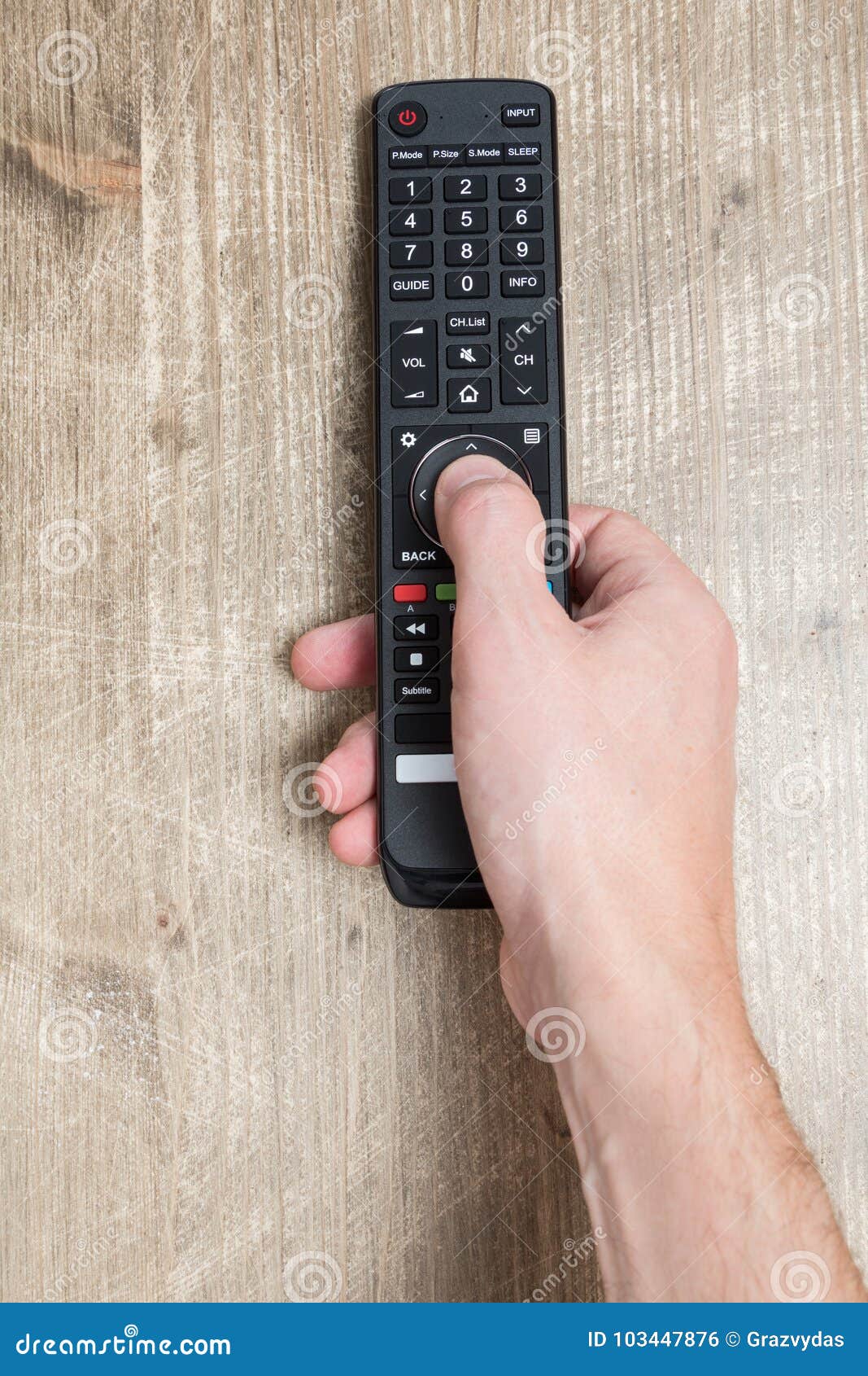 Hand with Tv controller stock photo. Image of technology - 103447876