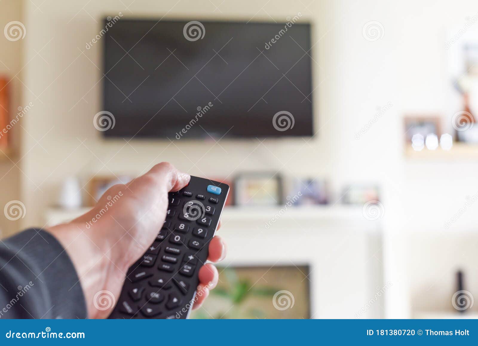 Hand with Tv Remote Control Switching Television on at Home Stock Photo ...