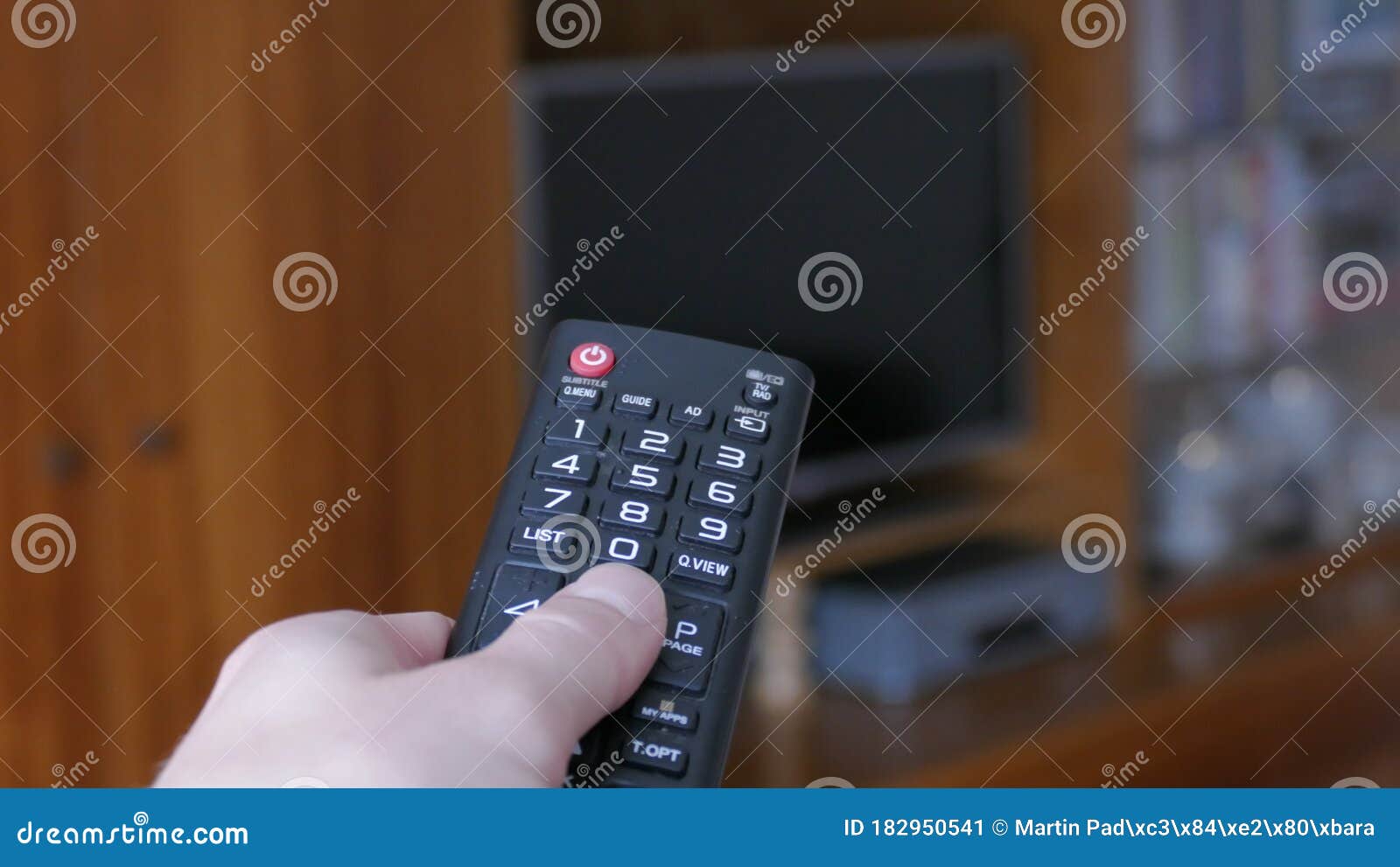 Hand with Tv Remote Control Switching Television on at Home Stock Image ...
