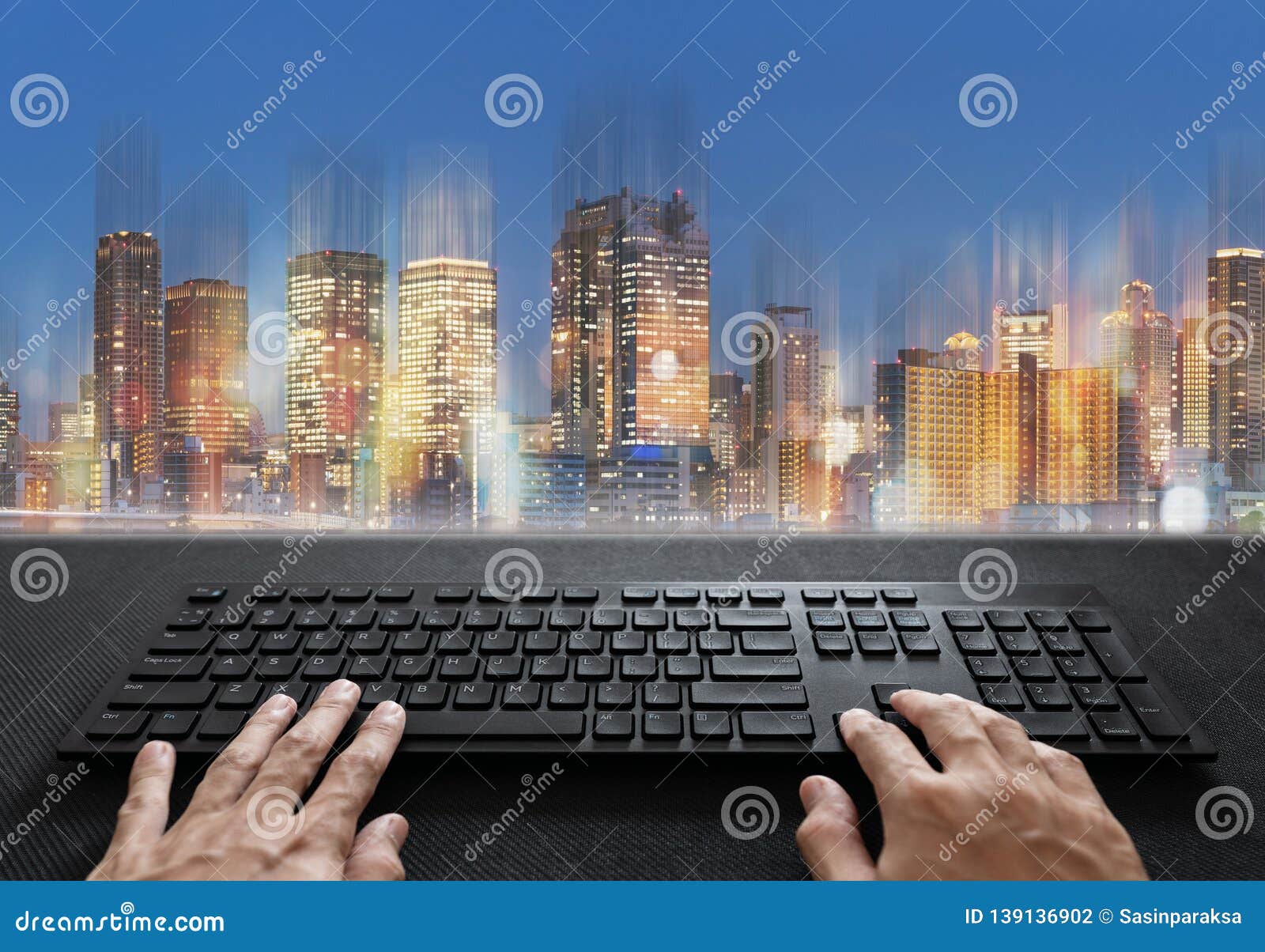 Hand Typing on Computer Keyboard and Modern Buildings Stock Photo ...