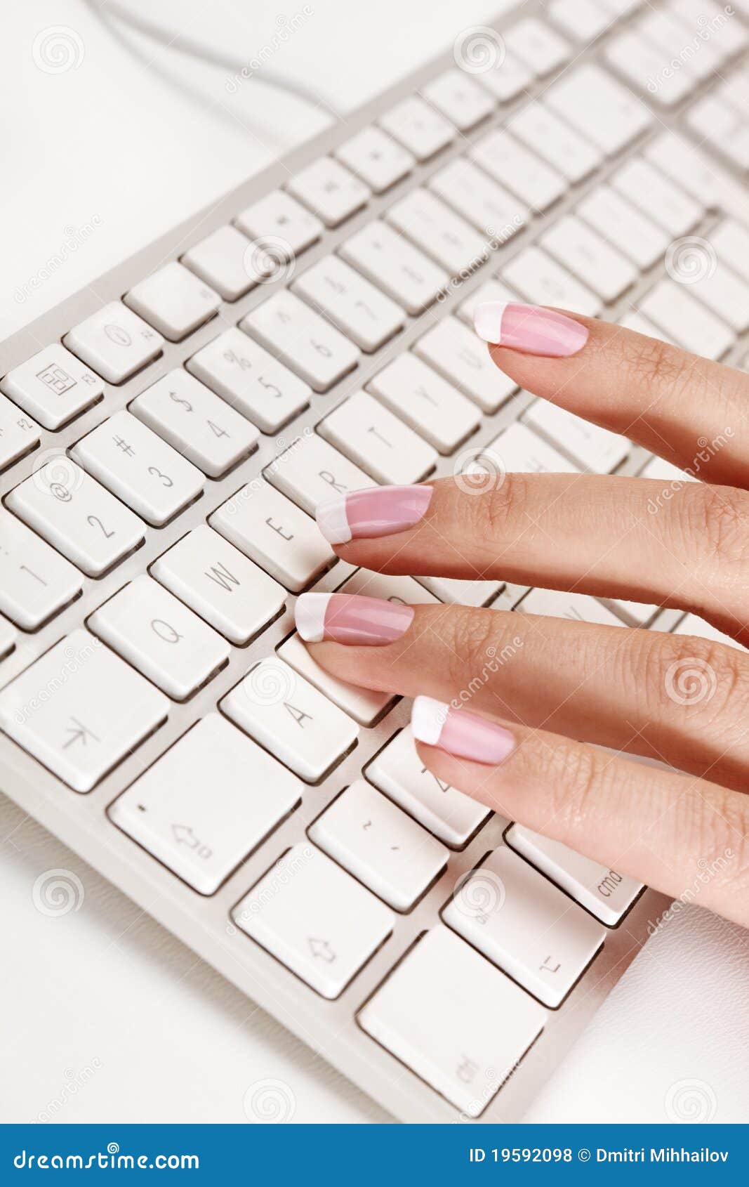 Hand typing on a keyboard stock photo. Image of nails - 19592098