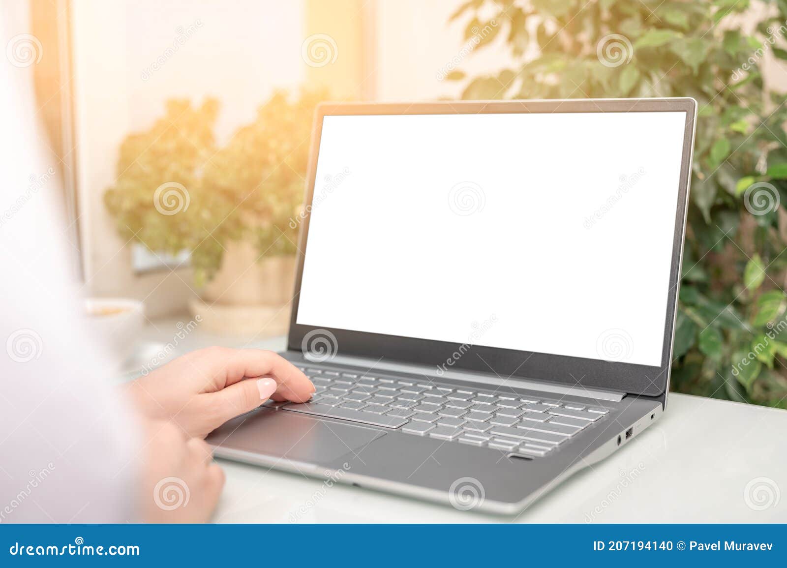 Hand Typing Laptop Computer Showing Blank White Screen on Table Office ...