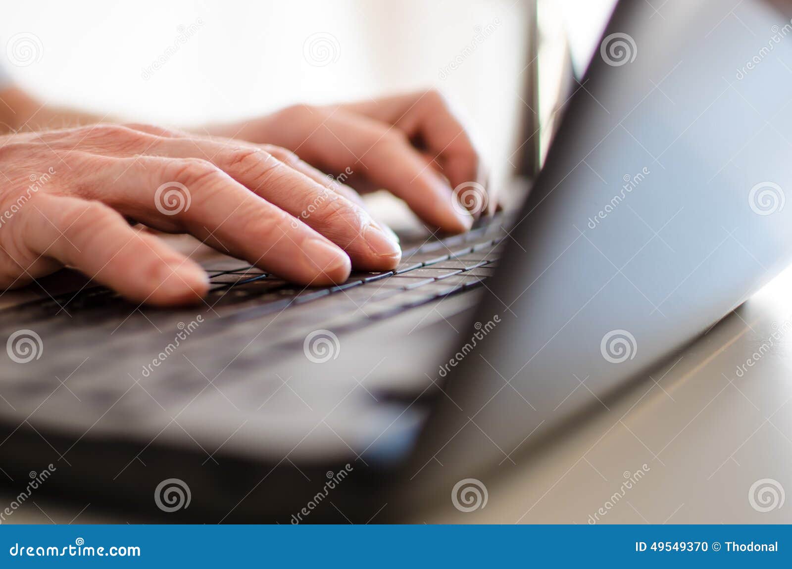 Hand typing on a laptop stock photo. Image of busy, technology - 49549370
