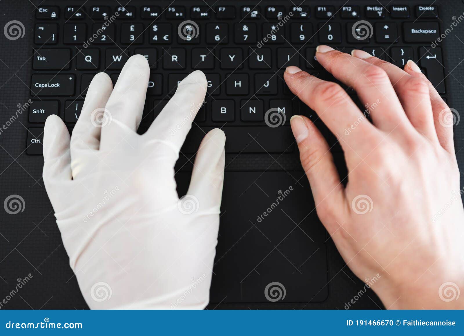 Hand Typing on Shared Computer Keyboard at Work Wearing Disposable ...